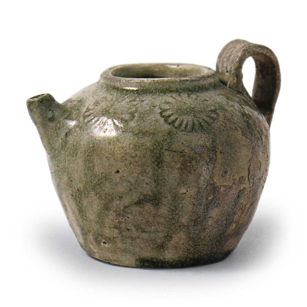 Seto ware: ewer with handle with stamped ornament, ash glaze ...