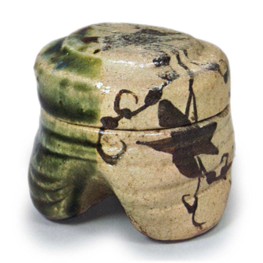 Oribe incense caddy with scrolling grass design – Ceramics Story